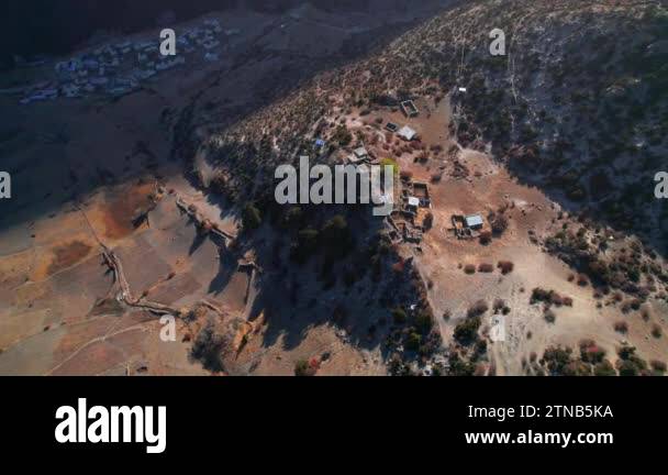 Aerial revealing view village buildings in high altitude over Khangshar ...
