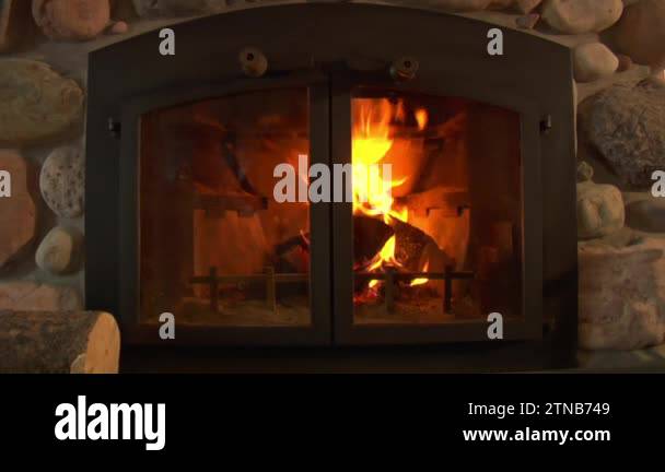 Glass fireplace doors Stock Videos & Footage - HD and 4K Video Clips ...