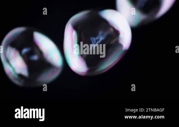 Colorful Soap Bubbles Fly in an Empty Space on Isolated Black ...
