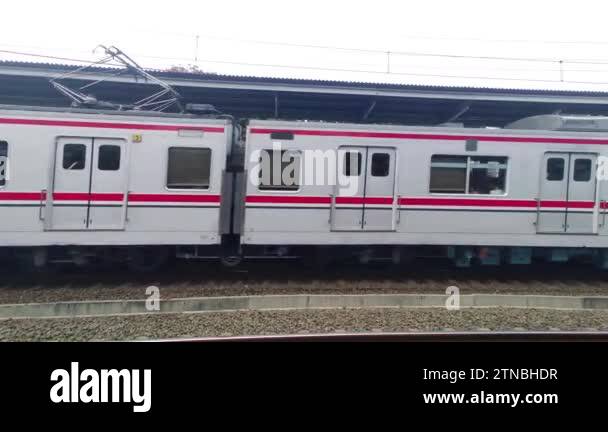 Commuter line train at the station. Commuter rail system for Greater ...