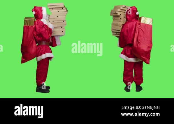 Santa claus with sack and boxes of pizza, working as deliveryman with ...