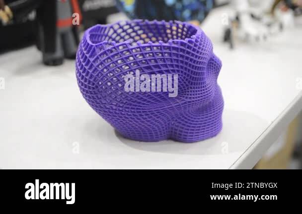 Object prototype of human skull printed on 3D printer from melted ...