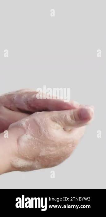 Vertical video. Hygiene habit. Microbe prevention. Woman washing hands ...