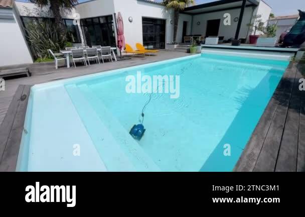Underwater pool vacuum cleaner. Robotic cleaning of the pool floor ...