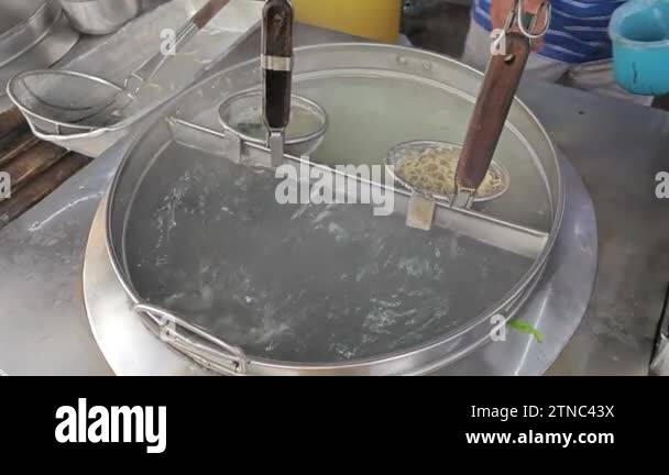 Basket strainer Stock Videos & Footage - HD and 4K Video Clips - Alamy