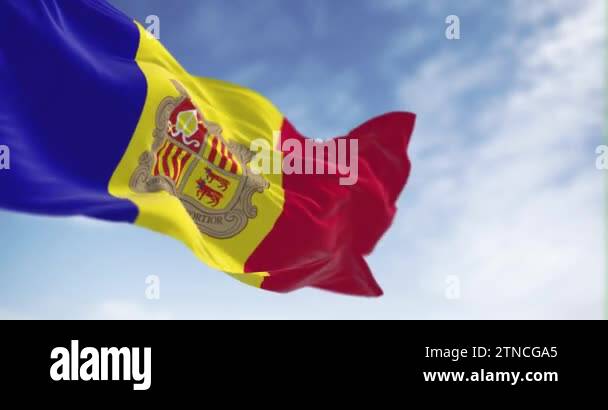 Flag of the Principality of Andorra waving on a clear day. Vertical ...