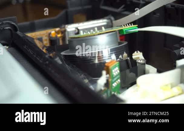 Close up of VHS play head side view with casette tape inserting and ...