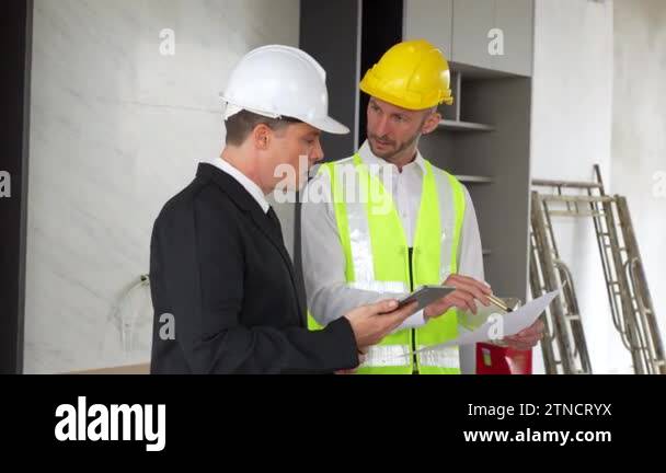 Architect team working with blueprints for architectural plan, engineer ...