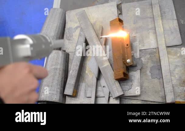 Laser cleaning of metal. Industrial removal of rust of metal surface ...