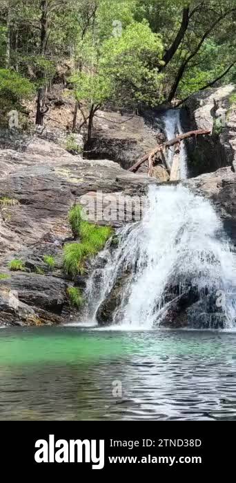 Paradise Place in the jungle mountain lake with a waterfall on the left ...