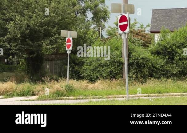 two do not enter road street signs, one in foreground and the other in ...