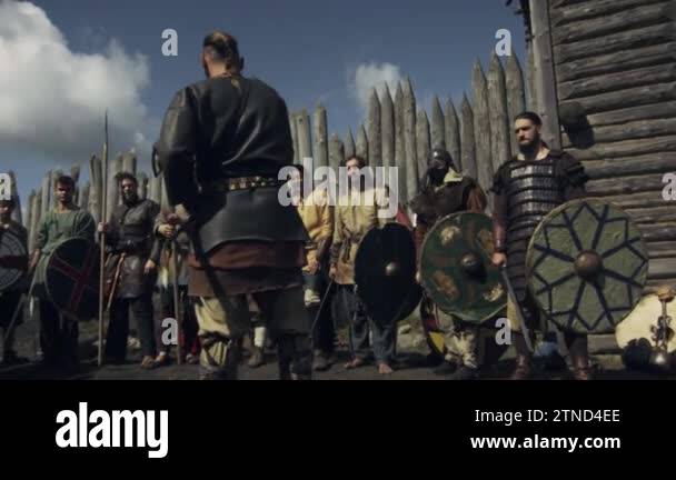 Army Leader Inspiring his Warriors with Battle Speech and Raising Sword ...
