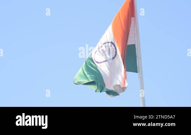 India flag flying high at Connaught Place with pride in blue sky, India ...