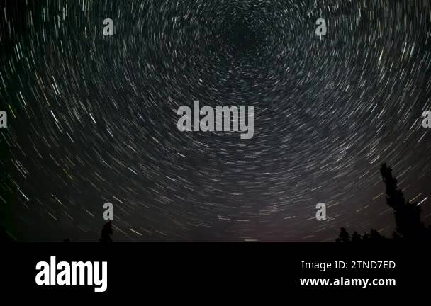 Stars move around a polar star. Time lapse of Star trails in the night ...