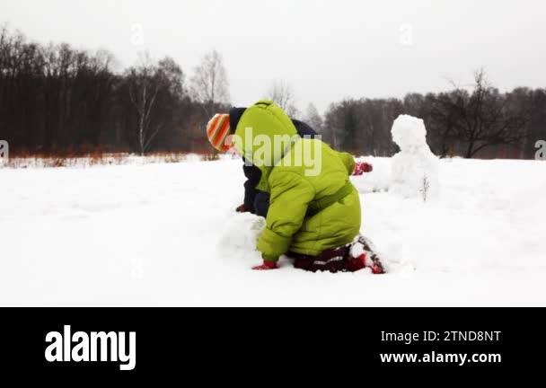 Snow children play snowman Stock Videos & Footage - HD and 4K Video ...