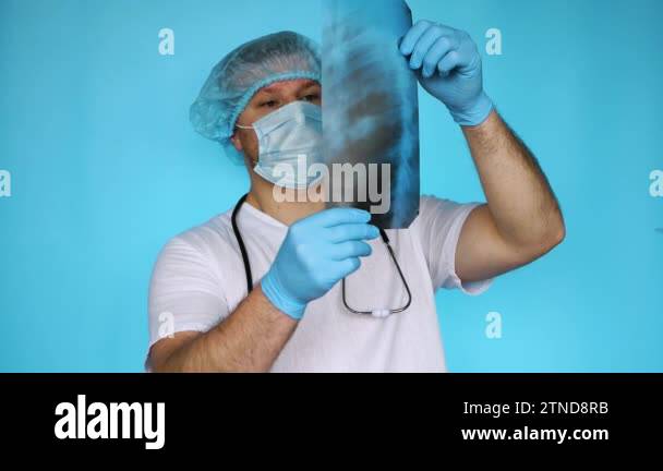 The surgeon diagnoses the ultrasound of the human ribs. The doctor in ...