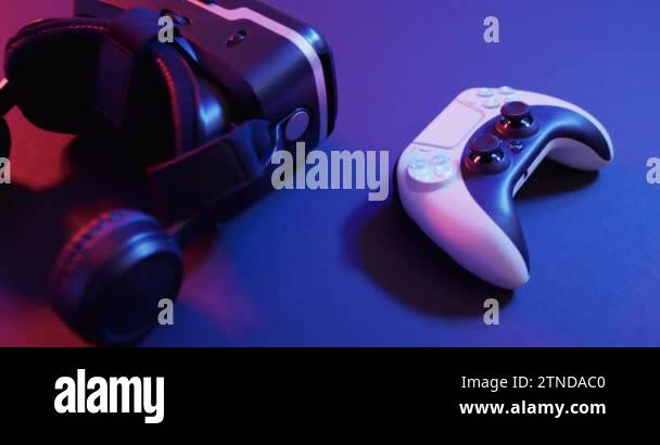 Video of close up of video game pad controller and vr headset with copy ...