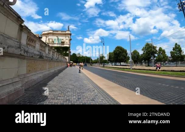 BUDAPEST, HUNGARY - JULY 7, 2023: Tourists driving electric scooters on ...