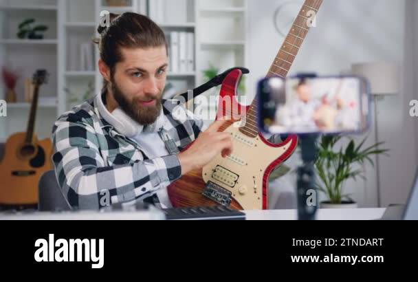 Caucasian male teacher blogger recording video class tutorial for play ...