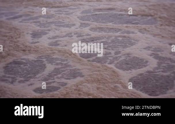 Powerful Stream of Dirty, Used Water Foam Pool For Filtration. Urban ...