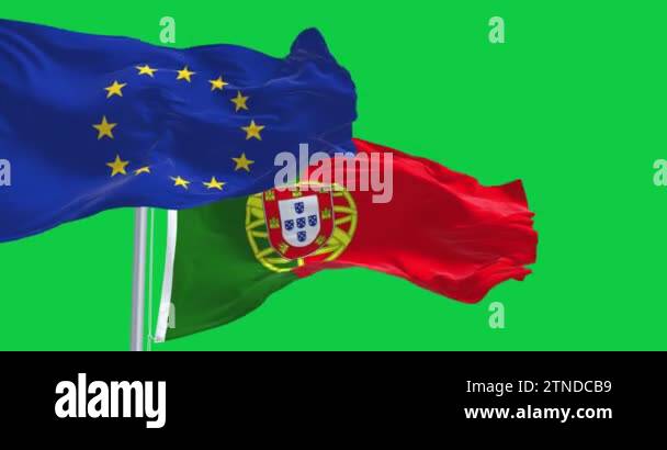 Flags of Portugal waving with European Union flag isolated on a green ...