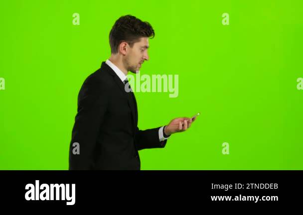 Guy looks at the photo on the phone and finds a list of pictures ...