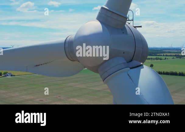 Canadian hydro wind turbine with blades spin. Windmills on the food ...