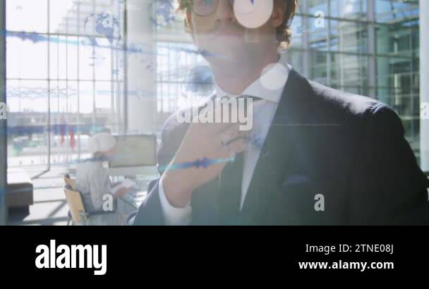 Animation of graphs, globes and computer language, smiling caucasian ...