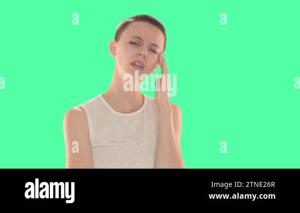 Beautiful bald girl, with short hair brunette, has headache, on a the ...