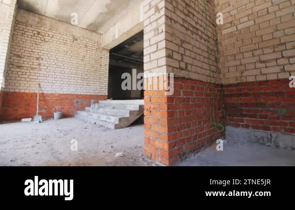 Inner premise of erected brick building on construction site. Project ...