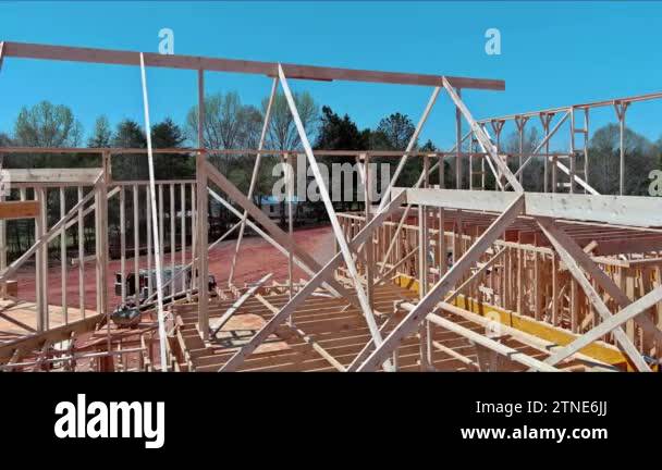 Construction site during framework new residential house with wooden ...