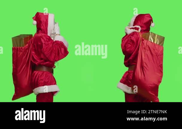 Romantic man in santa costume giving air kisses, cute while he is ...