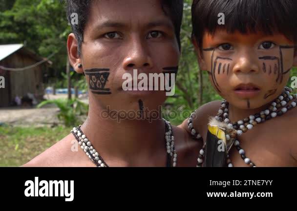 Father and Son at an indigenous tribe in the Amazon Stock Video Footage ...