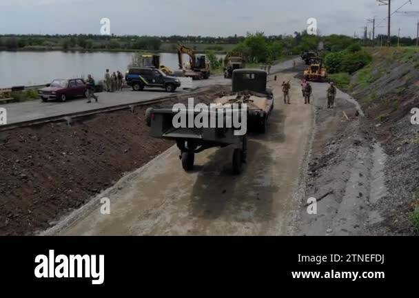 Pontoon bridge of the Ukrainian army. Installation of a temporary ...