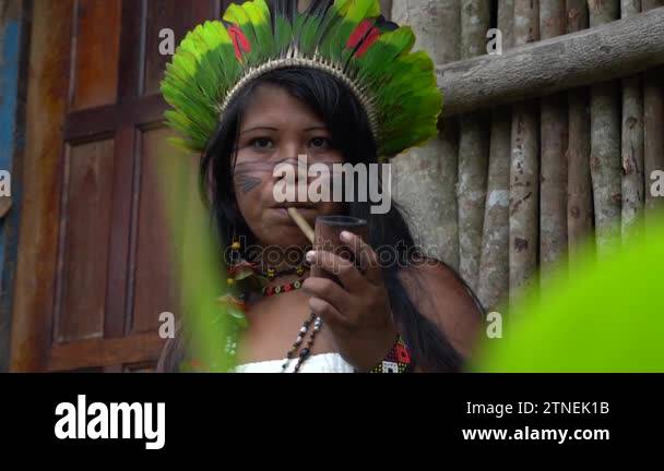 Indigenous Woman Smoking Pipes in a Tupi Guarani Tribe, Brazil Stock ...