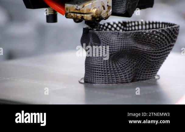 3D printer printing prototype of human skull from molten plastic ...