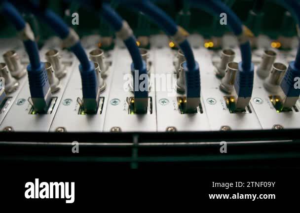 close-up of a pile of network patch cables in a server room in a data ...