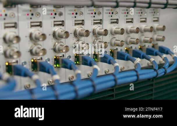 close-up of a pile of network patch cables in a server room in a data ...