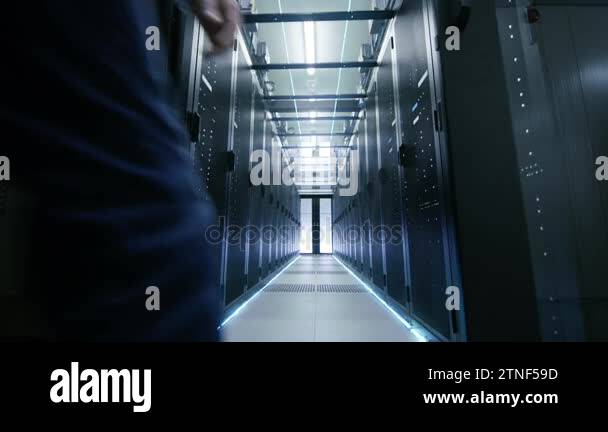 Server Engineer in Data Center Walks Through Sliding Doors and Opens ...