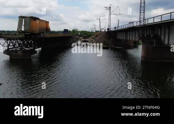 Pontoon bridge of the Ukrainian army. Installation of a temporary ...