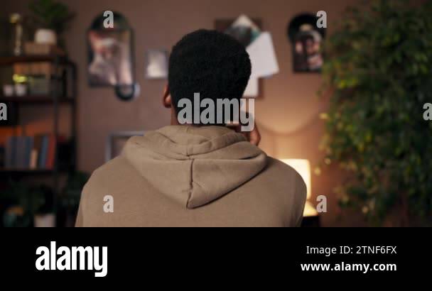 African man wearing t-shirt with humanitarian organizations logo ...
