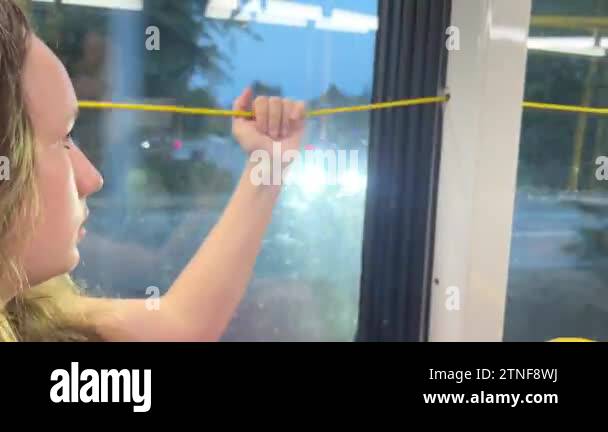 girl on the bus pulls the stopcock When you need to get off a special ...