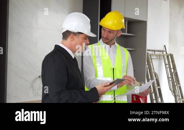 Architect team working with blueprints for architectural plan, engineer ...