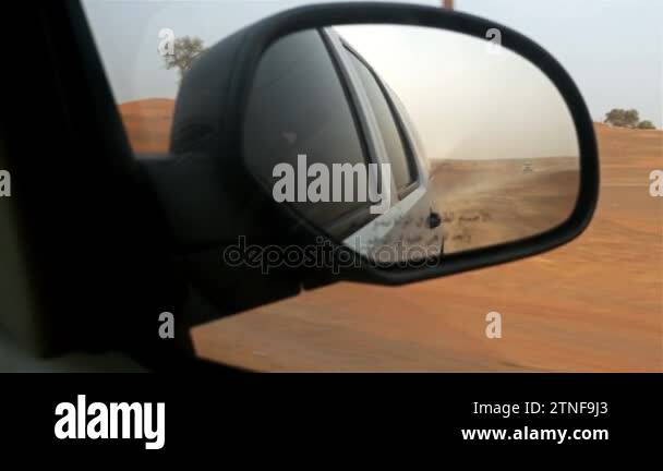 4x4 off road land vehicle taking tourists on desert dune bashing safari ...