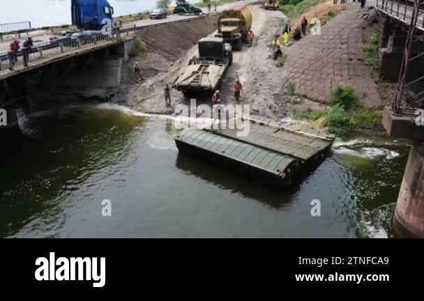 Pontoon bridge of the Ukrainian army. Installation of a temporary ...