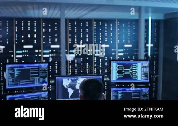 Technical Controller Working at His Workstation with Multiple Displays ...