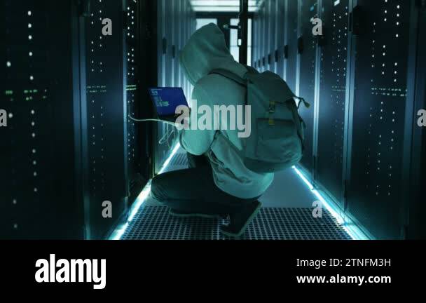 Hacker With Laptop Connects to Rack Server and Steals Information from ...