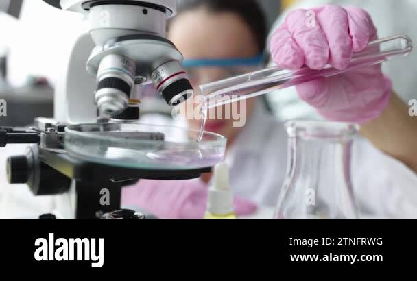 Scientist conducting study gel transparent liquid in laboratory using ...