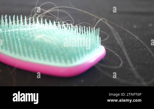 Comb with long teeth Stock Videos & Footage - HD and 4K Video Clips - Alamy