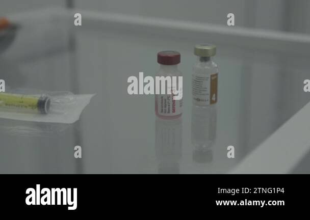 Solution for injections. Bottles with solution on the table. Close-up ...